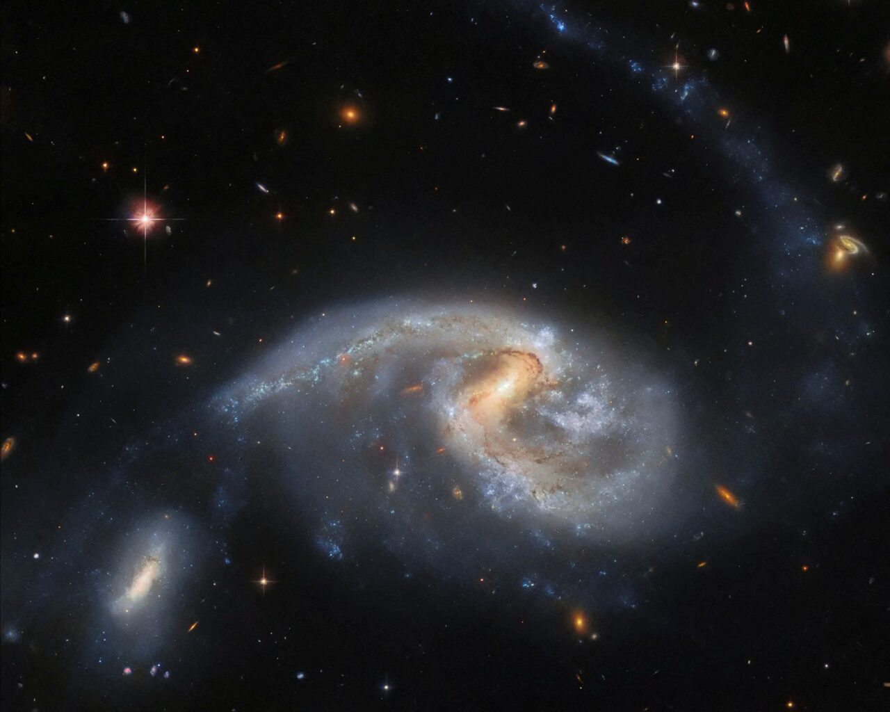 Hubble Peers at Pair of Closely Interacting Galaxies - Cerebral-Overload